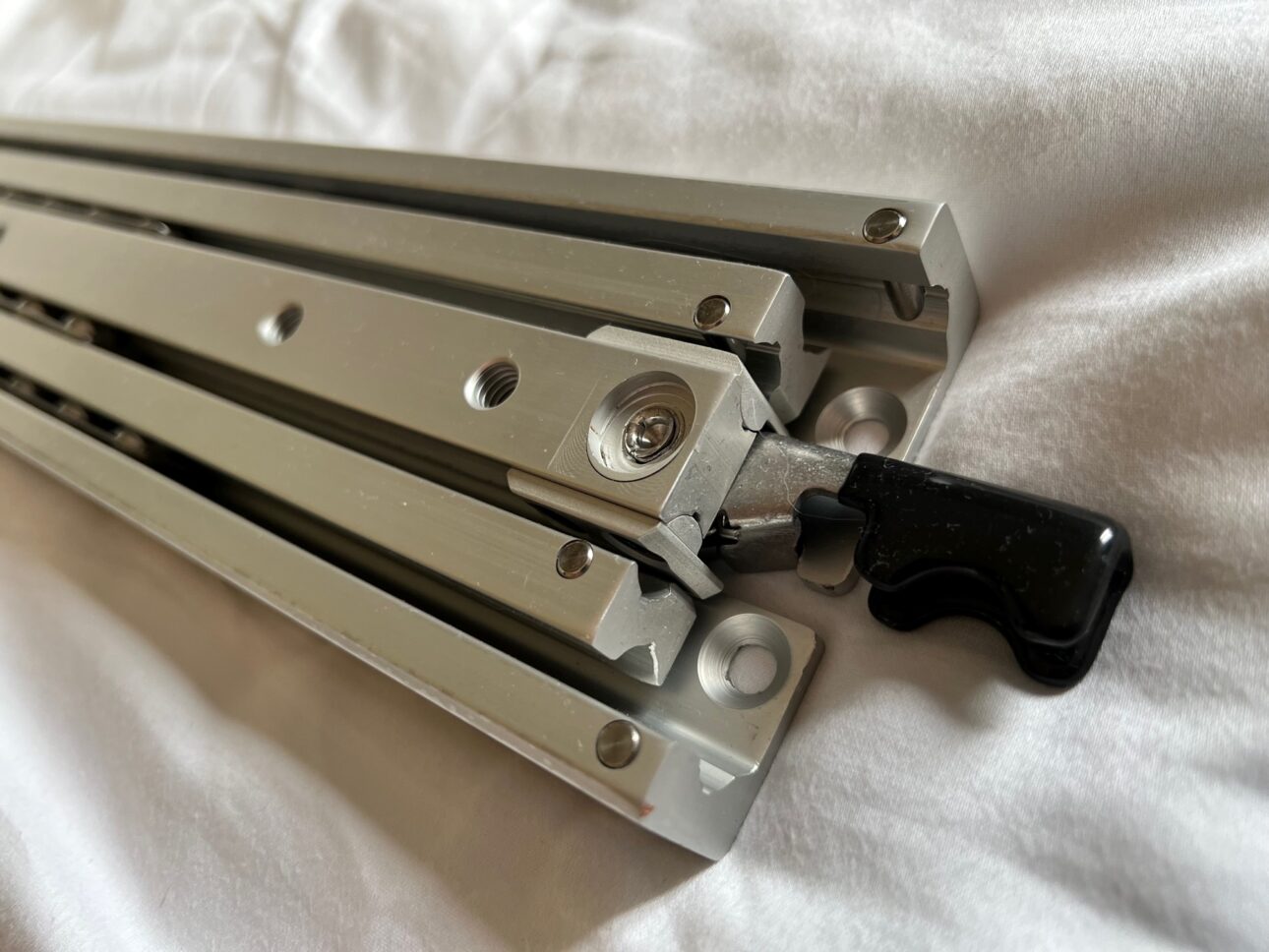 Non-corrosive, locking drawer slide with full extension