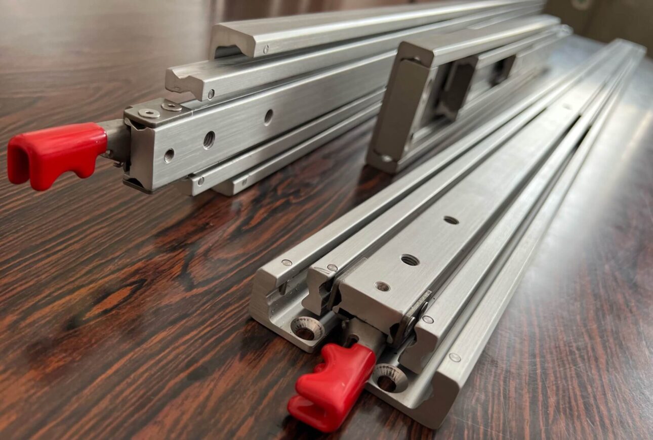 Non-corrosive, locking drawer slide with full extension